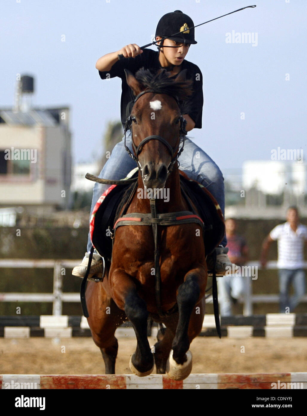 July 08, 2011 - Gaza city, Gaza Strip - A Palestinian rides a horse ...