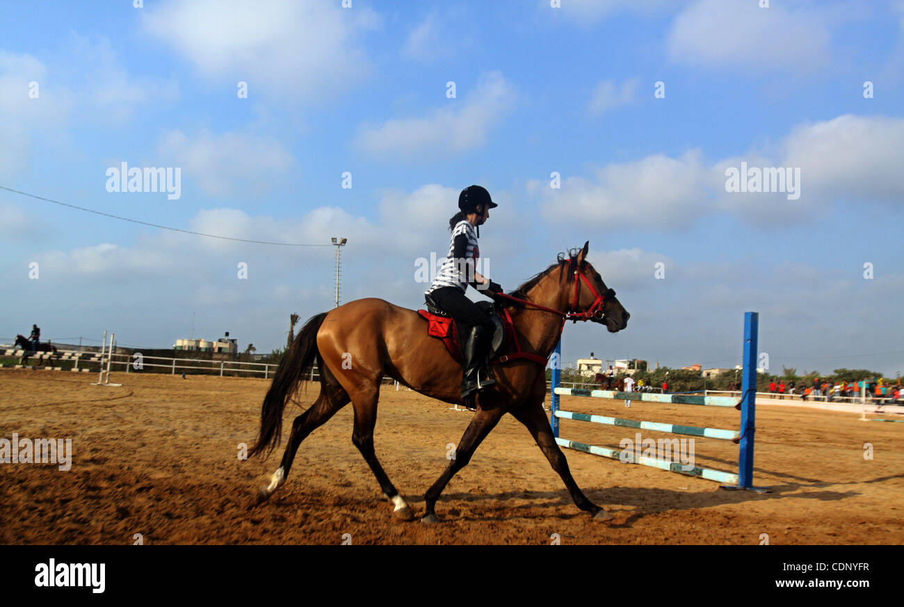 July 08, 2011 - Gaza city, Gaza Strip - A Palestinian rides a horse ...