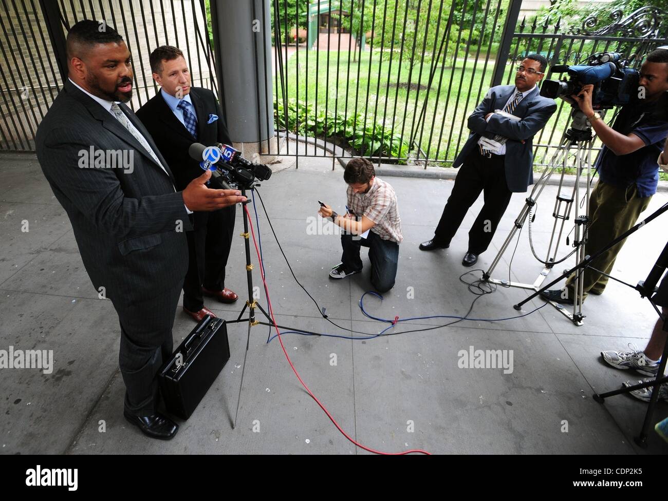 July 18, 2011 - Manhattan, New York, U.S. - Attorneys PIERRE BAZILE (L ...