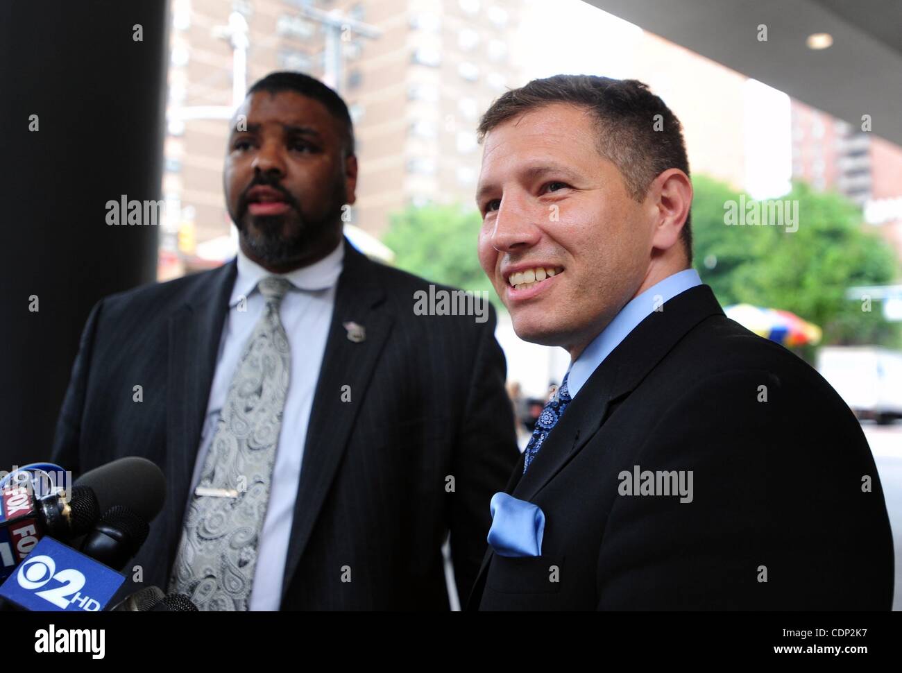 July 18, 2011 - Manhattan, New York, U.S. - Attorneys PIERRE BAZILE (L ...