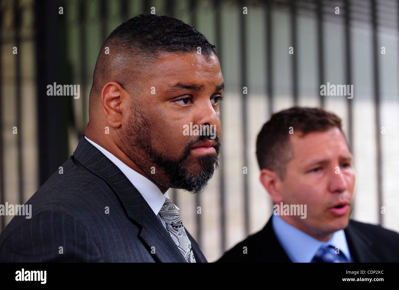 July 18, 2011 - Manhattan, New York, U.S. - Attorneys PIERRE BAZILE (L ...