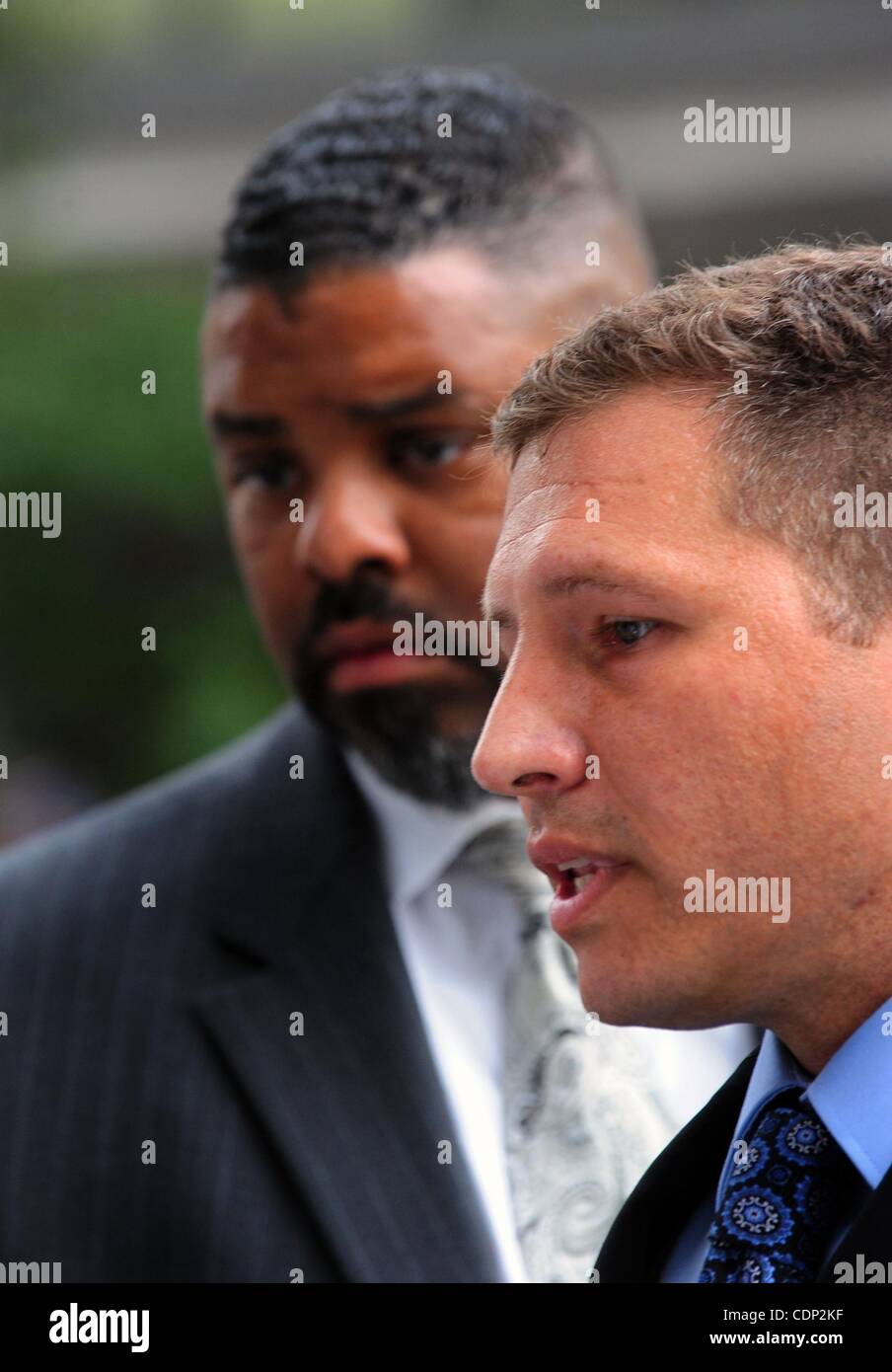 July 18, 2011 - Manhattan, New York, U.S. - Attorneys PIERRE BAZILE (L ...