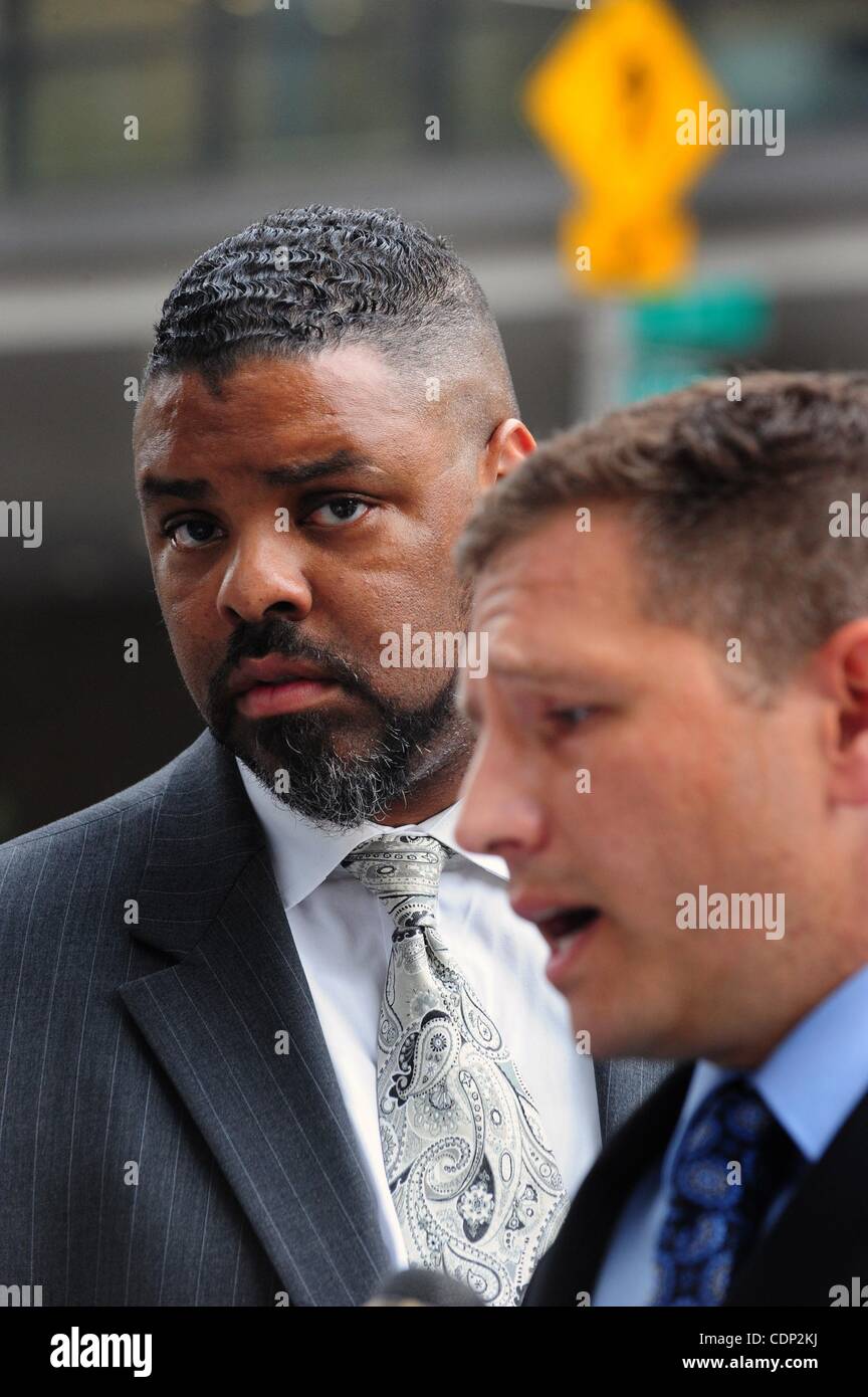 July 18, 2011 - Manhattan, New York, U.S. - Attorneys PIERRE BAZILE (L ...