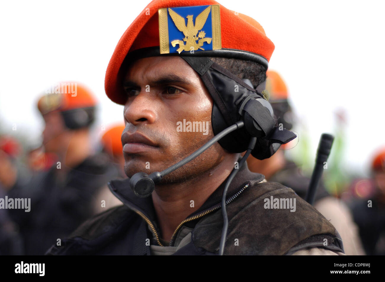 Indonesian soldiers attending a security roll call ahead of the ...