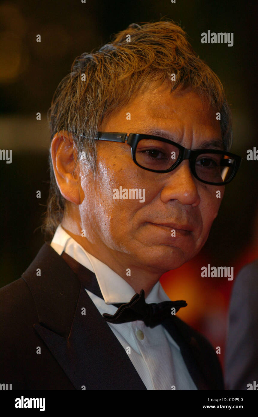 director Takashi Miike with producer Jeremy Thomas and screenwriter ...