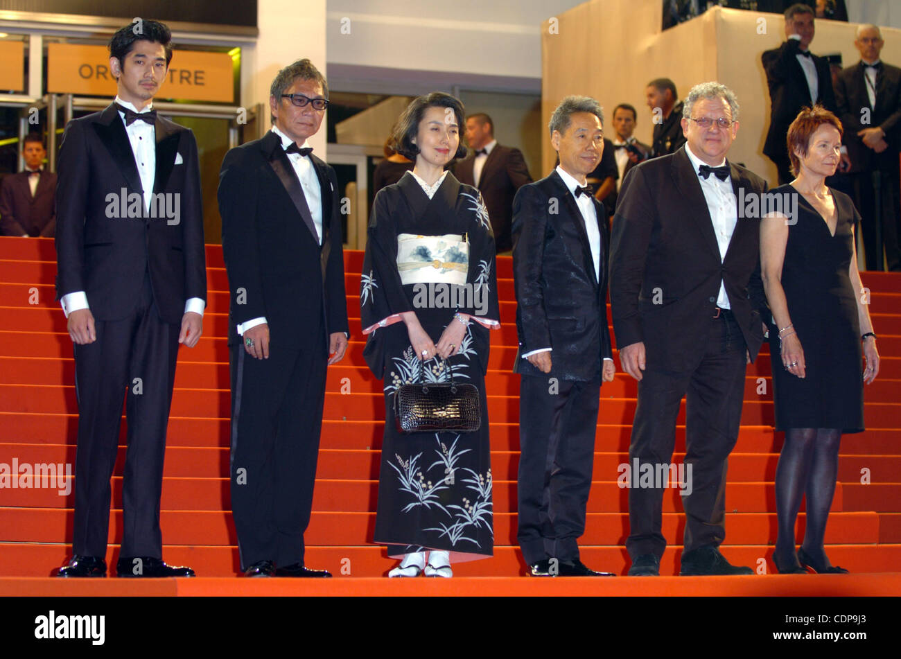 Actor Eita and director Takashi Miike with producer Jeremy Thomas and ...
