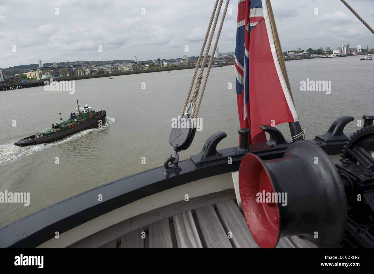 July 13, 2011 - London, England, UK - A tugboat is viewed atop the SS ...