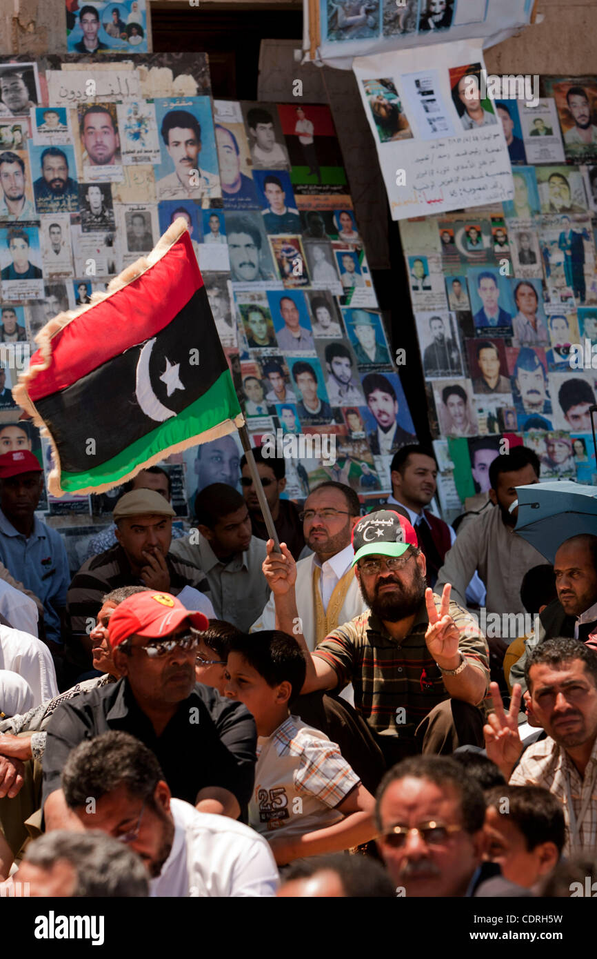 May 20, 2011 - Benghazi, Libya - People hold flags during the midday ...