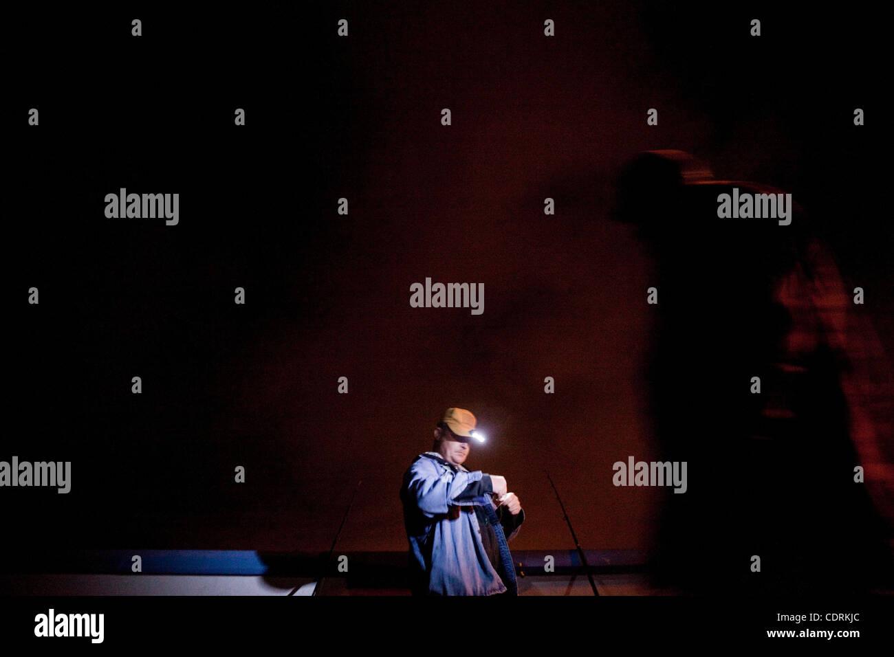 May 28, 2011 - San Clemente, California, U.S. - RON RIDDLE puts bait on ...
