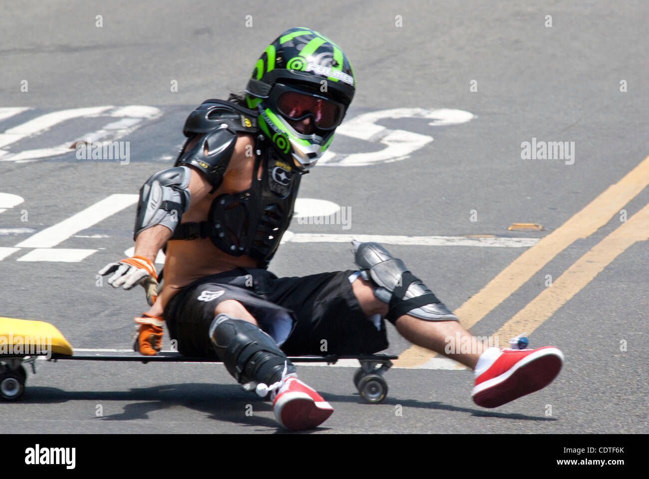 JAMES HOOTMANN (Mr.Organico) catches himself before falling at the ...