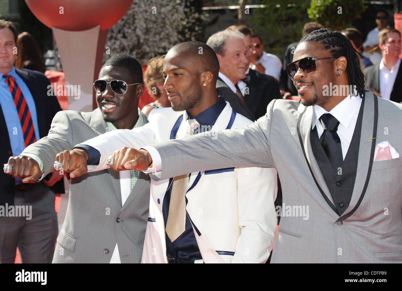 NFL player's Charlie Peprah, Jarrett Bush and Desmond Bishop show off ...