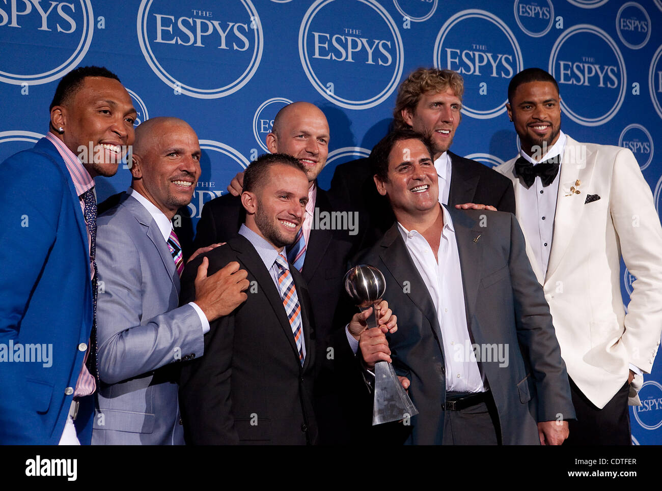 Members of the Dallas Mavericks and owner MARK CUBAN celebrate in the ...
