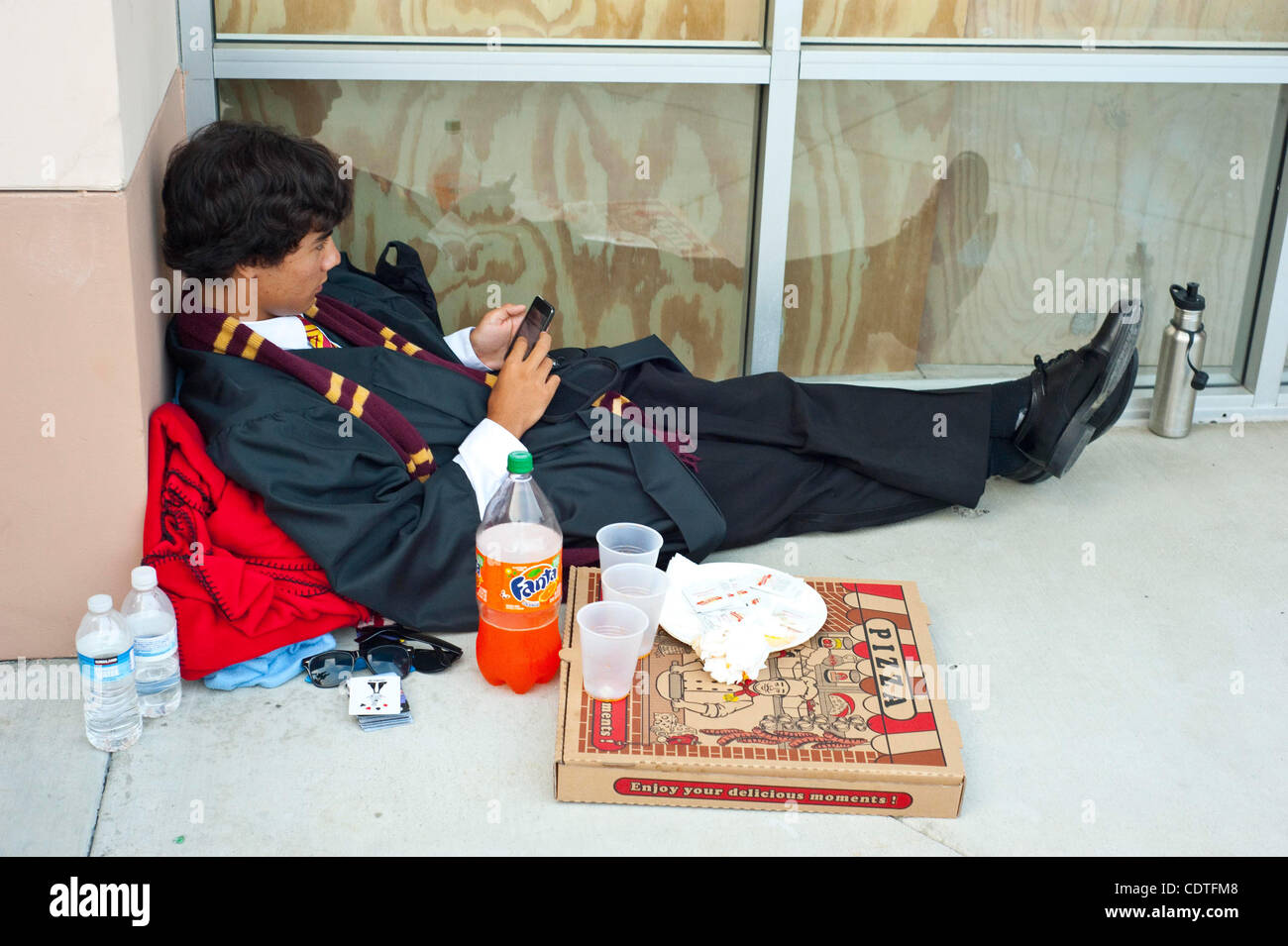 ANDREW SHERMAN (16) (Gryffindor) waits in line outside Kikorian theatre ...