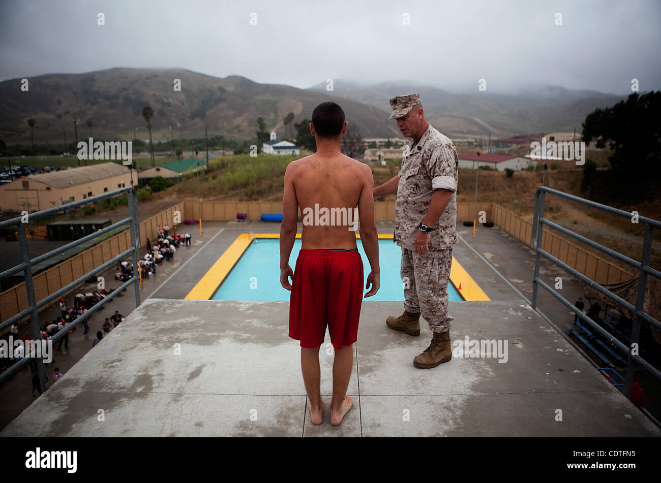 July 14, 2011 - Camp Pendelton, California, U.S. - A Devil Pup readies himself to jump off a 35 ...