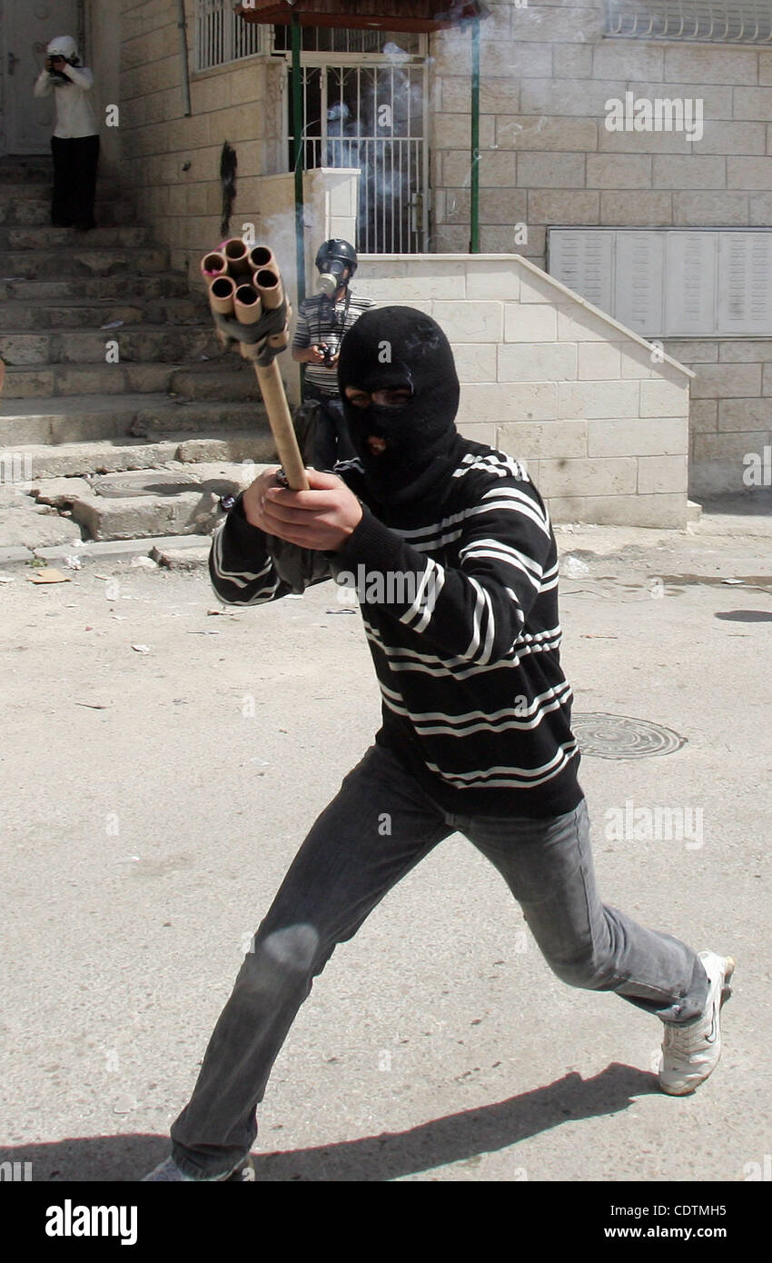 Mar 18, 2011 - Jerusalem, Israel - A Palestinian demonstrator shoots ...