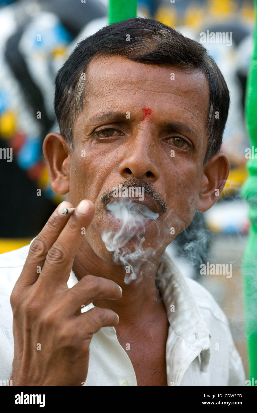 May 23, 2011 - Mysore, India - May 23, 2011, Mysore, India - A man ...