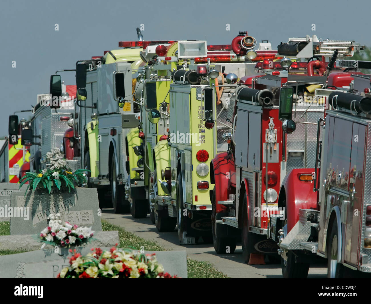 Fire trucks and other emergency vehicles fill Haven Hill Cemetery for ...