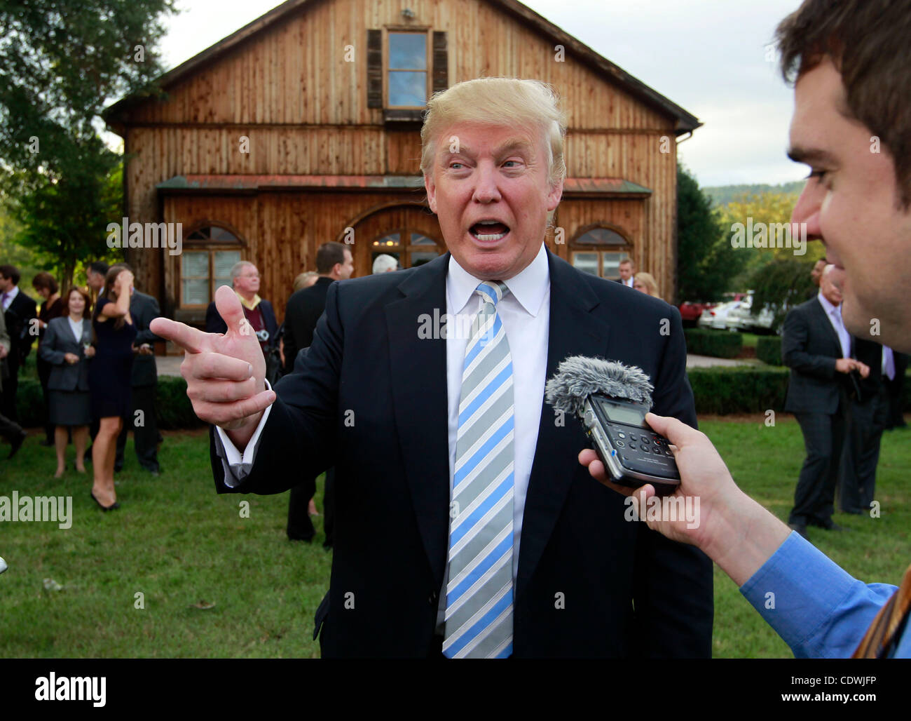 Oct. 04, 2011 - Charlottesville, VA. USA; Donald Trump talks with the ...