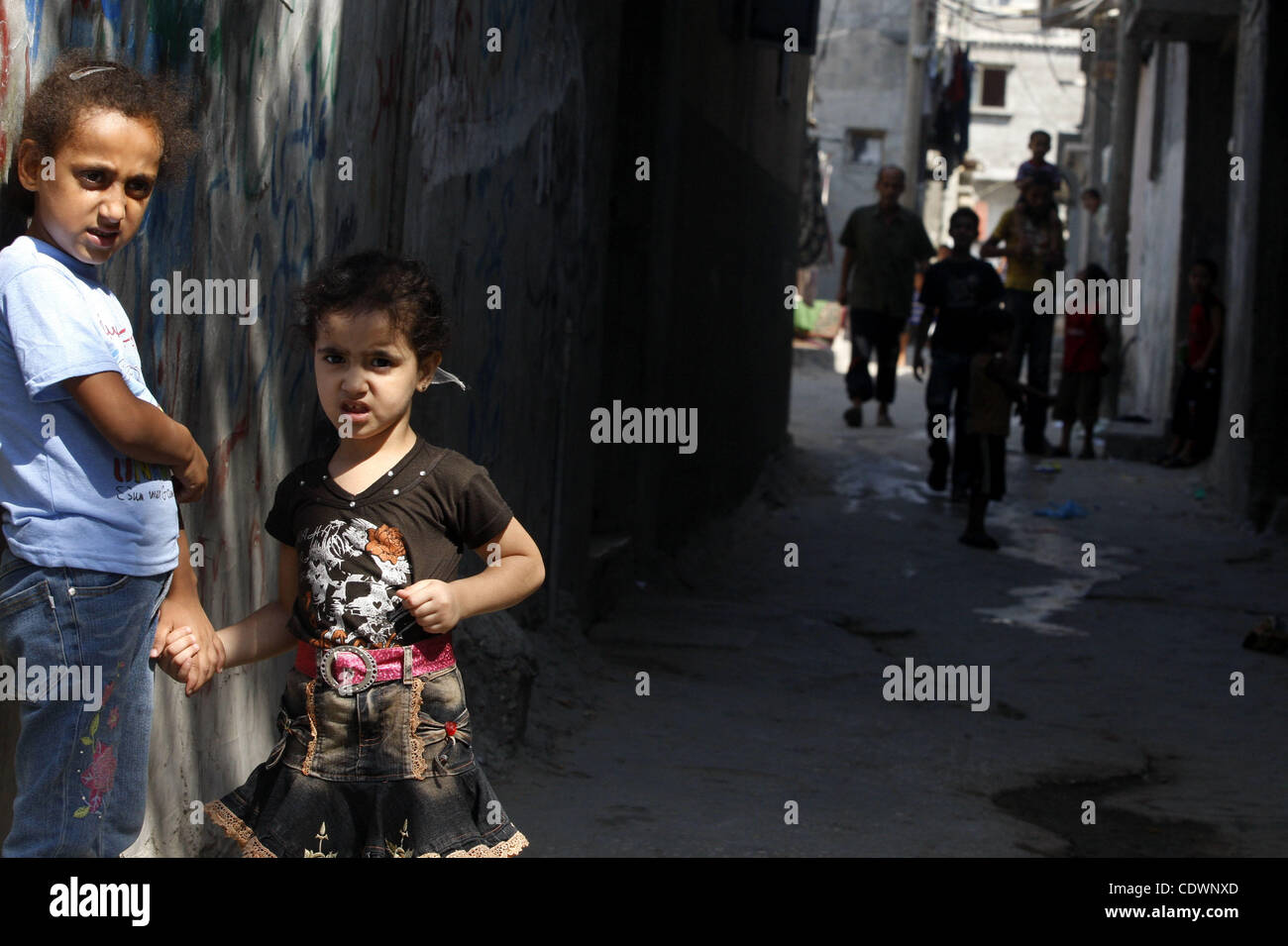 Palestinian children play in front of their house Al Shate` refugee ...