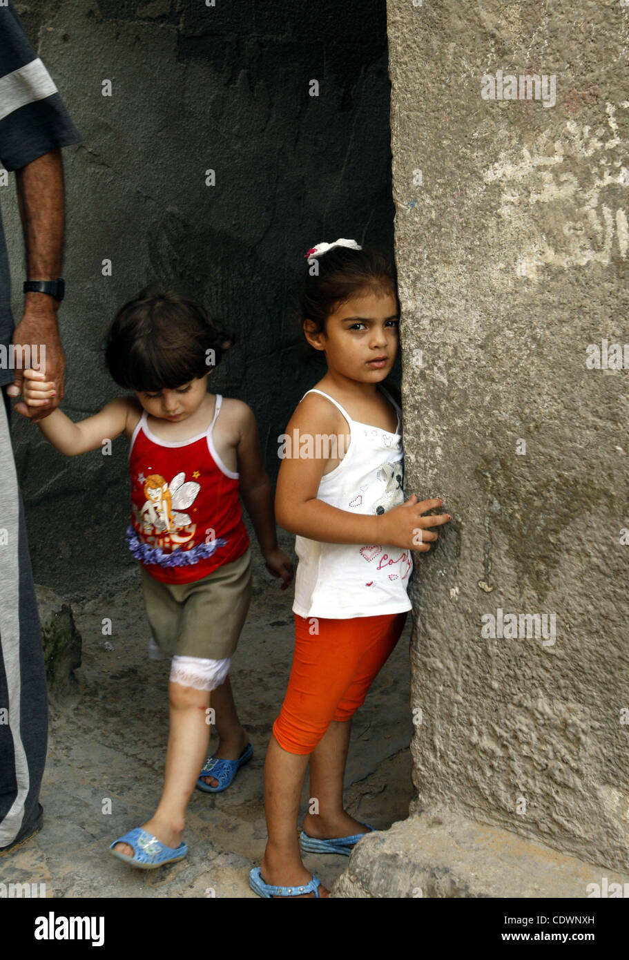 Palestinian children play in front of their house Al Shate` refugee ...