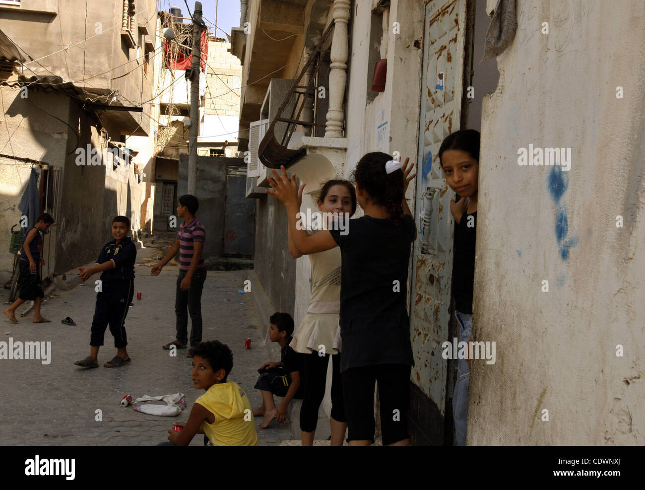 Palestinian children play in front of their house Al Shate` refugee ...