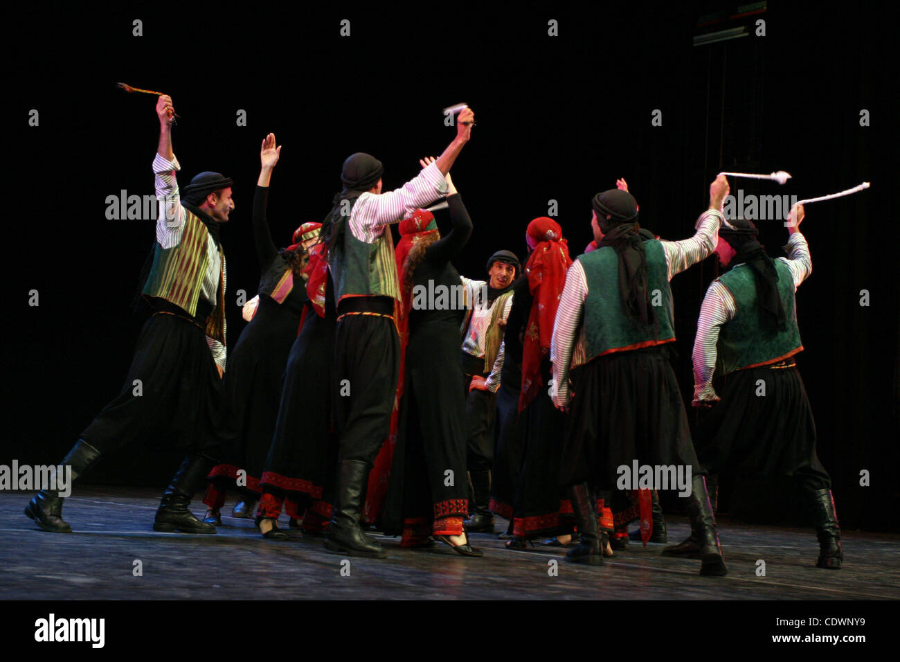Palestinian folklore dance troupe perform during an annual cultural ...