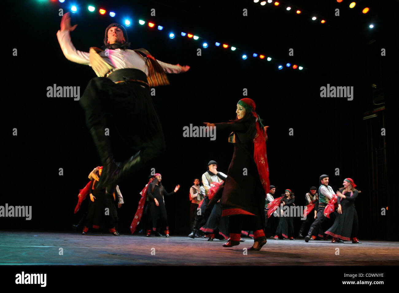 Palestinian folklore dance troupe perform during an annual cultural ...