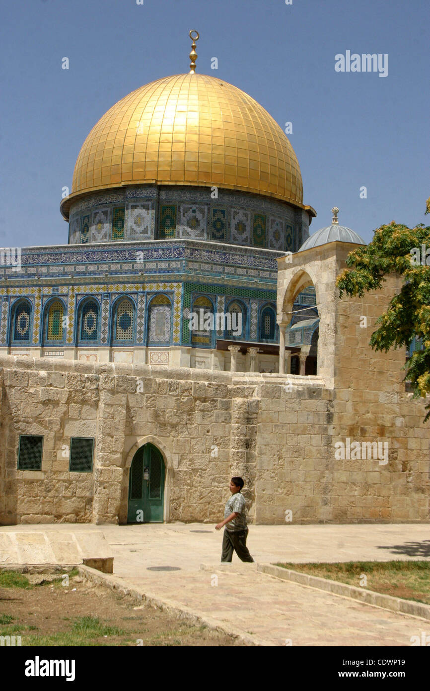 A Palestinian Muslim walks in the yards of al Aqsa Mosque, after al ...