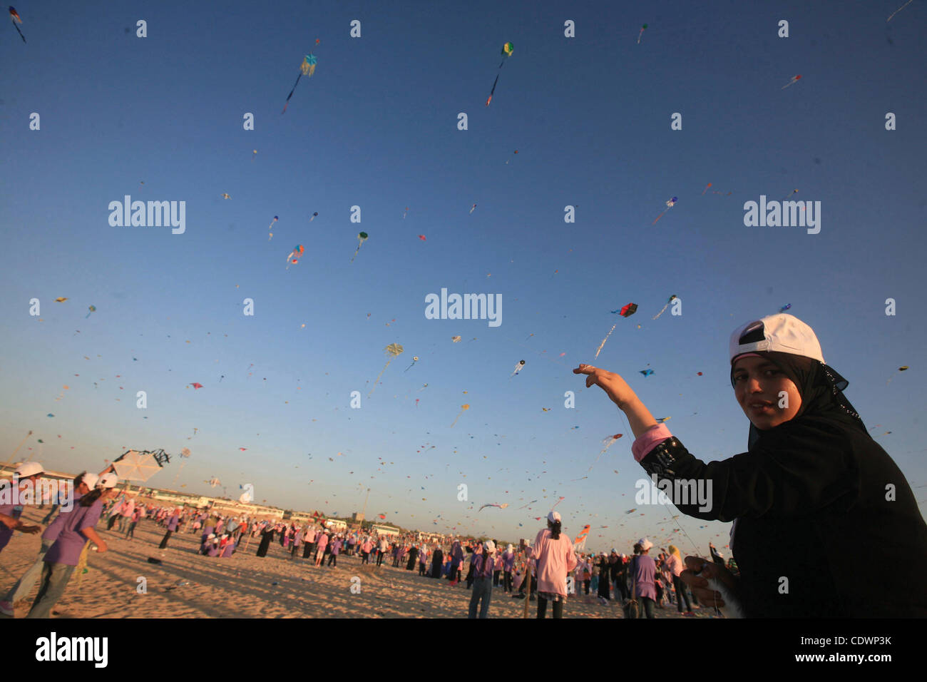 Palestinian children fly kites during an event organized by the United ...