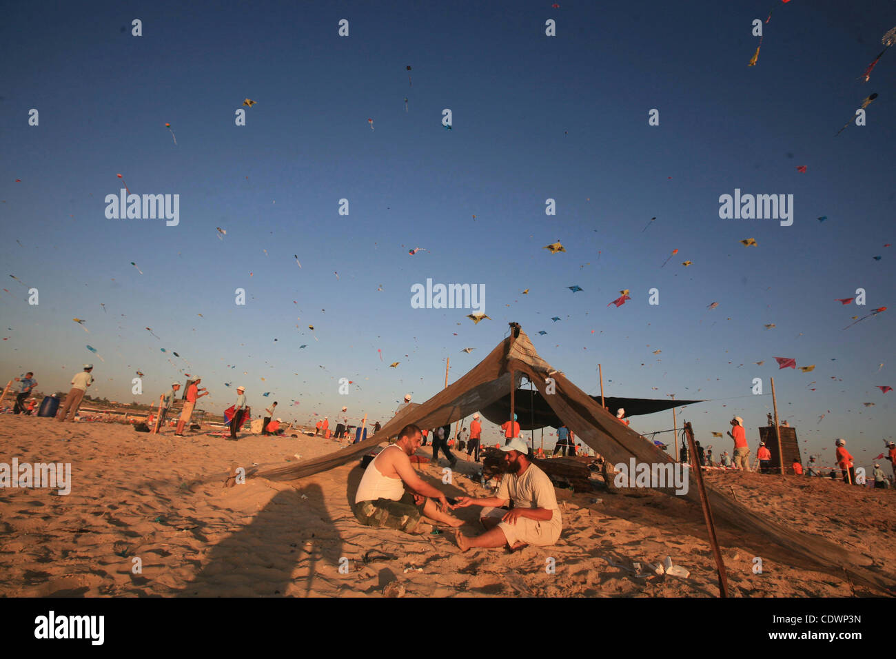 Palestinian children fly kites during an event organized by the United ...