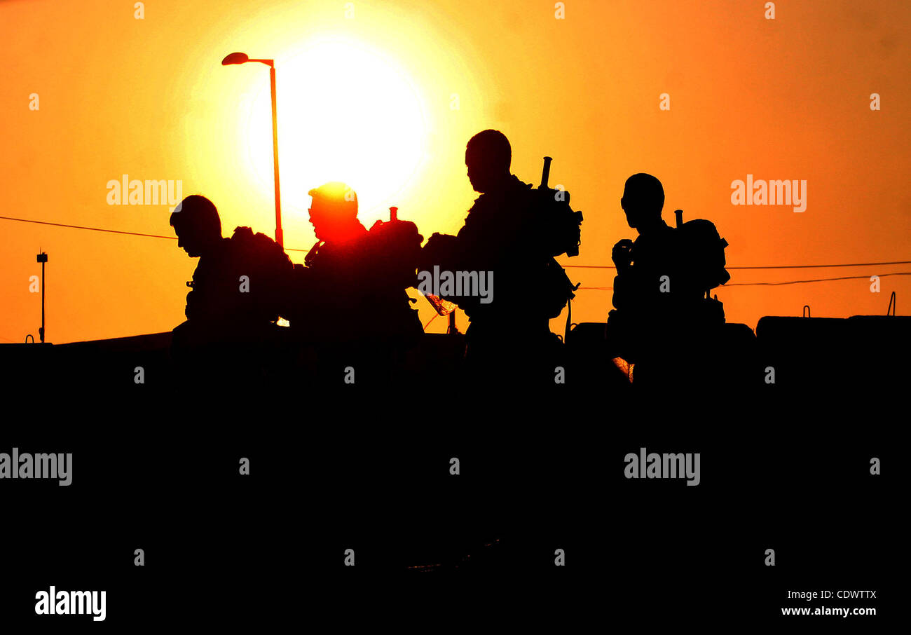 Israeli soldiers stands guard at Israel's Qalandiya checkpoint as ...