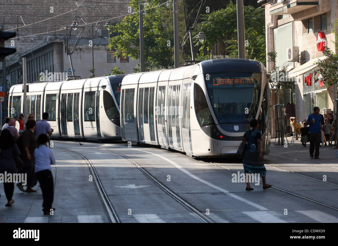 Palestinian and israeli Passengers ride a light rail train, Ten days ...