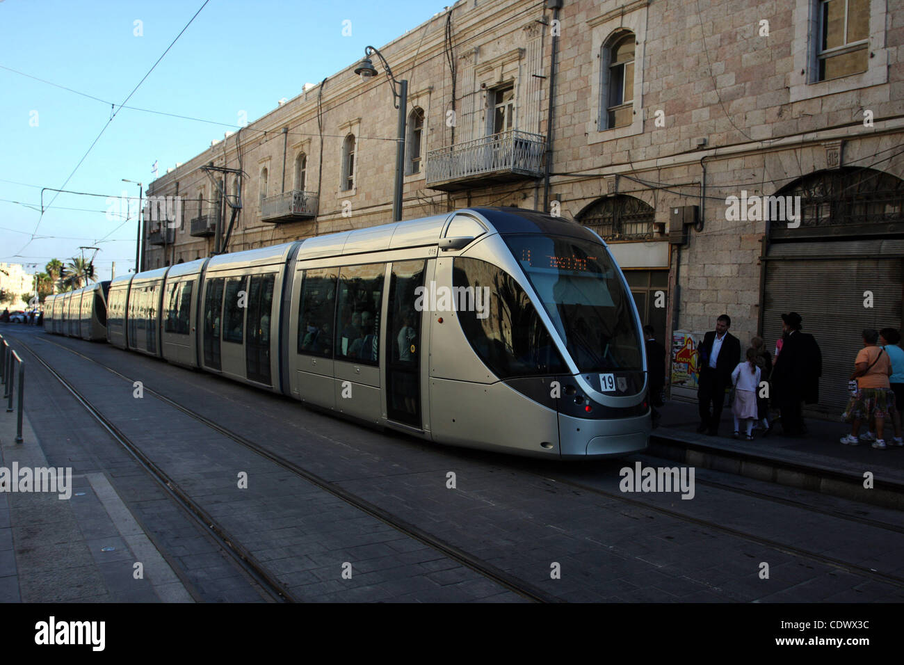 Palestinian and israeli Passengers ride a light rail train, Ten days ...