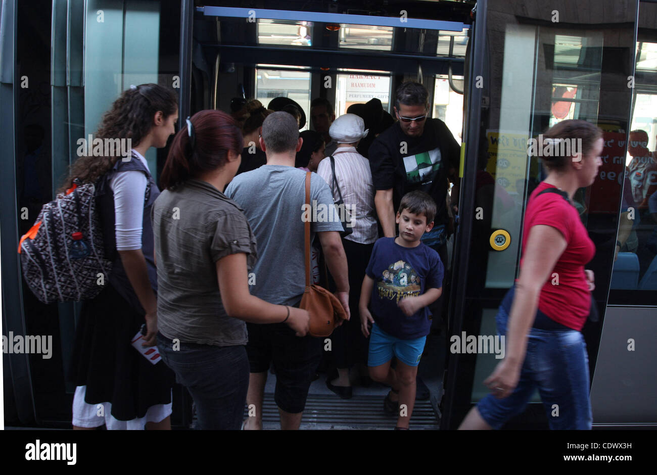 Palestinian and israeli Passengers ride a light rail train, Ten days ...