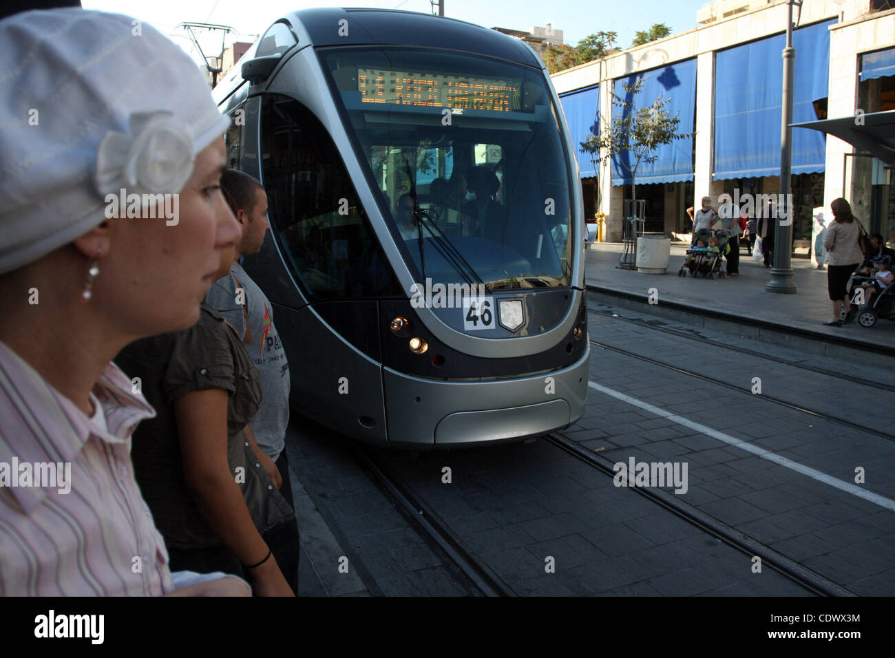 Palestinian and israeli Passengers ride a light rail train, Ten days ...