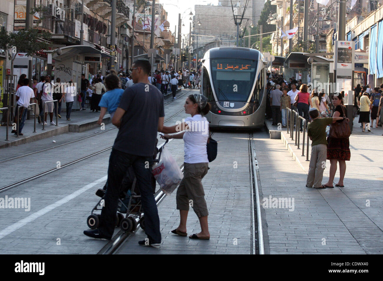 Palestinian and israeli Passengers ride a light rail train, Ten days ...