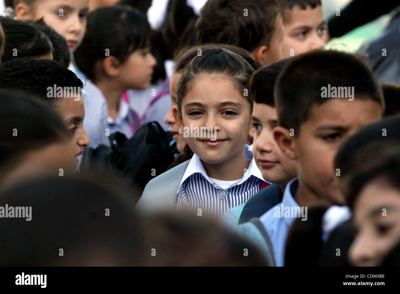 Palestinian students return back to their school in the morning of the ...