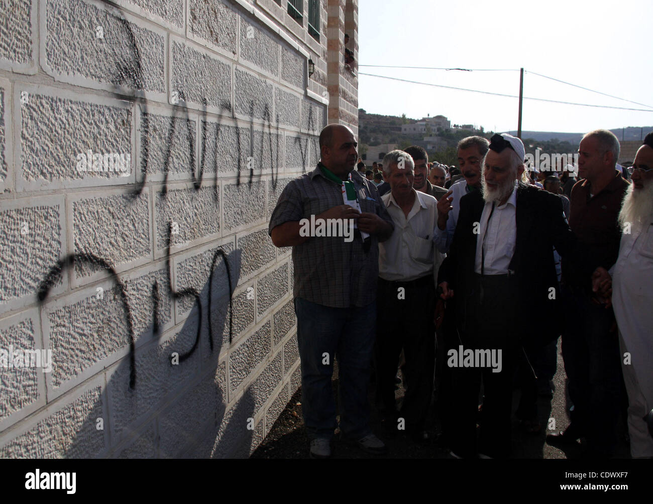 Jewish rabbi Menachem Froman leads a reconciliation visit of Jewish ...
