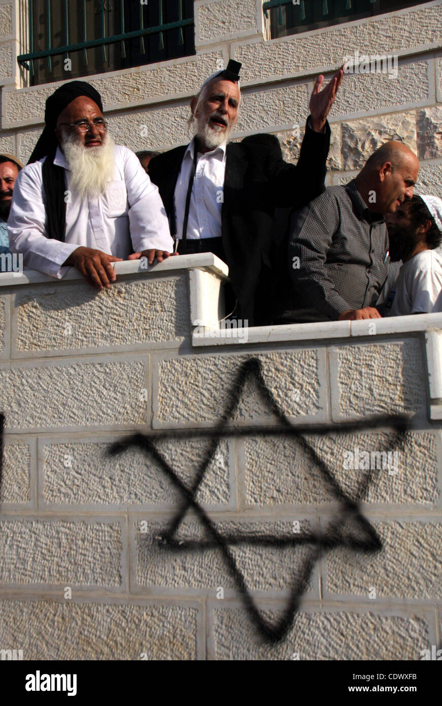 Jewish rabbi Menachem Froman leads a reconciliation visit of Jewish ...