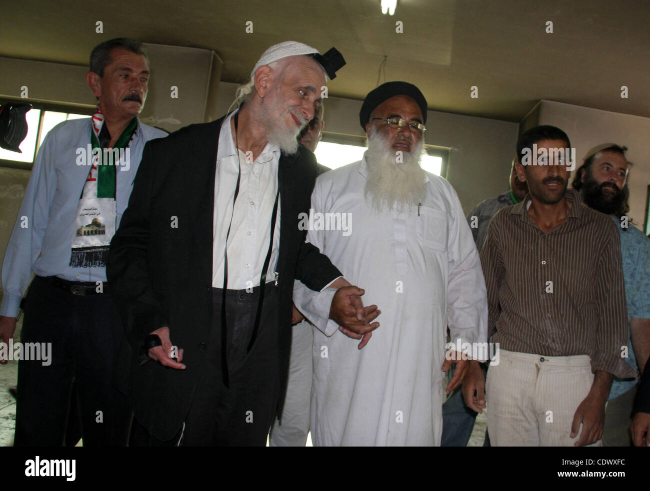 Jewish rabbi Menachem Froman leads a reconciliation visit of Jewish ...