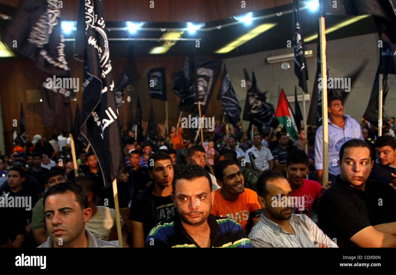 Palestinian supporters of Popular Resistance Committees take part in a ...
