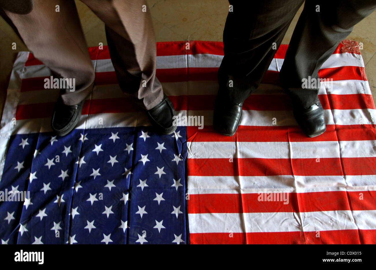 Palestinian supporters of Popular Resistance Committees step on ...