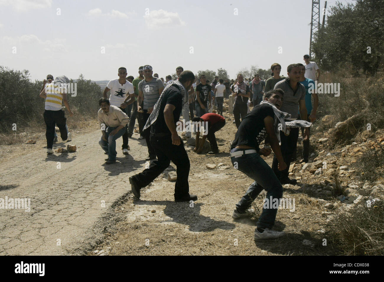 Palestinian stone throwers clash with Israeli soldiers on September 30 ...