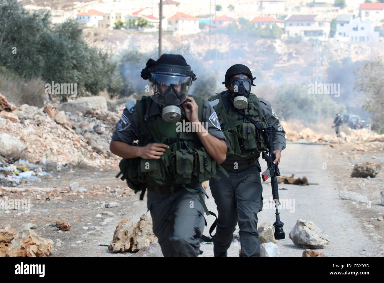 Israeli soldiers clash with Palestinian stone throwers on September 30 ...