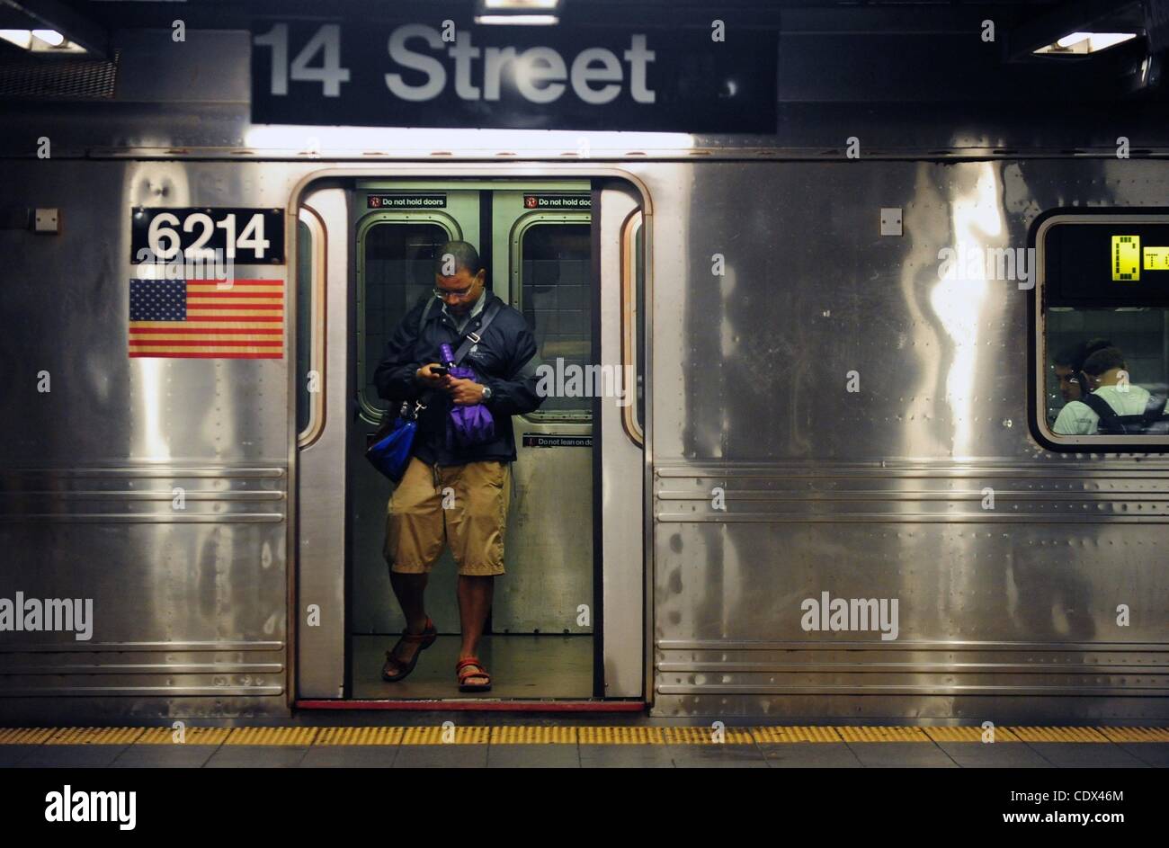 Aug. 27, 2011 - Manhattan, New York, U.S. - Riders board a C line train ...