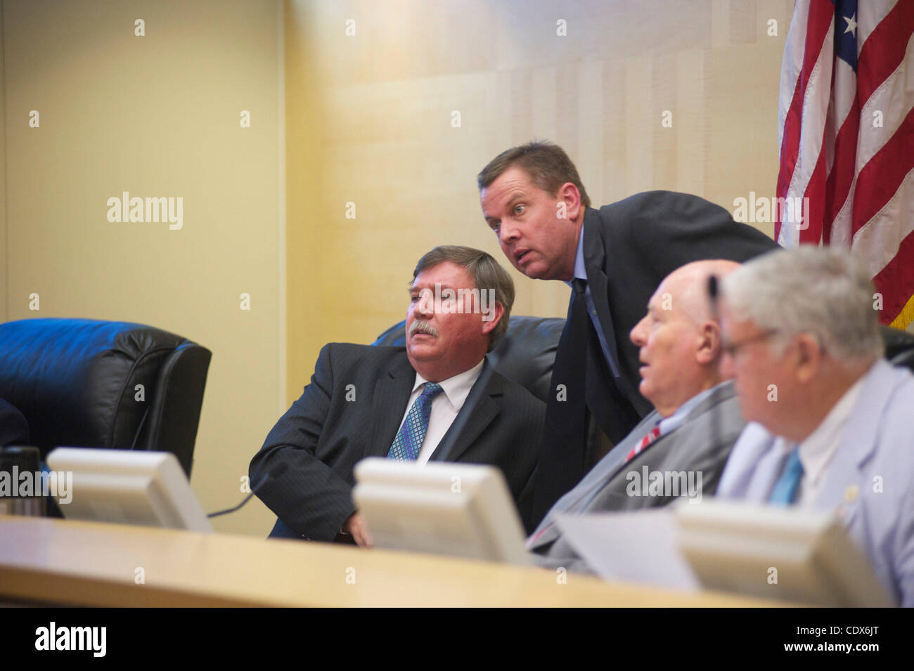 Councilman Bruce Whitaker, seated, and City Manager Joe Felz, standing ...