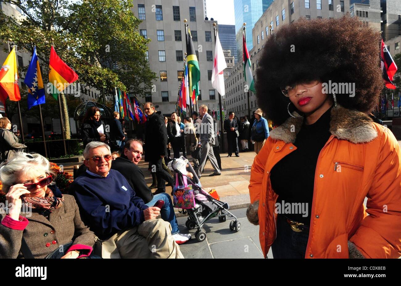 Nov. 3, 2011 - Manhattan, New York, U.S. - A woman sitting on bench ...