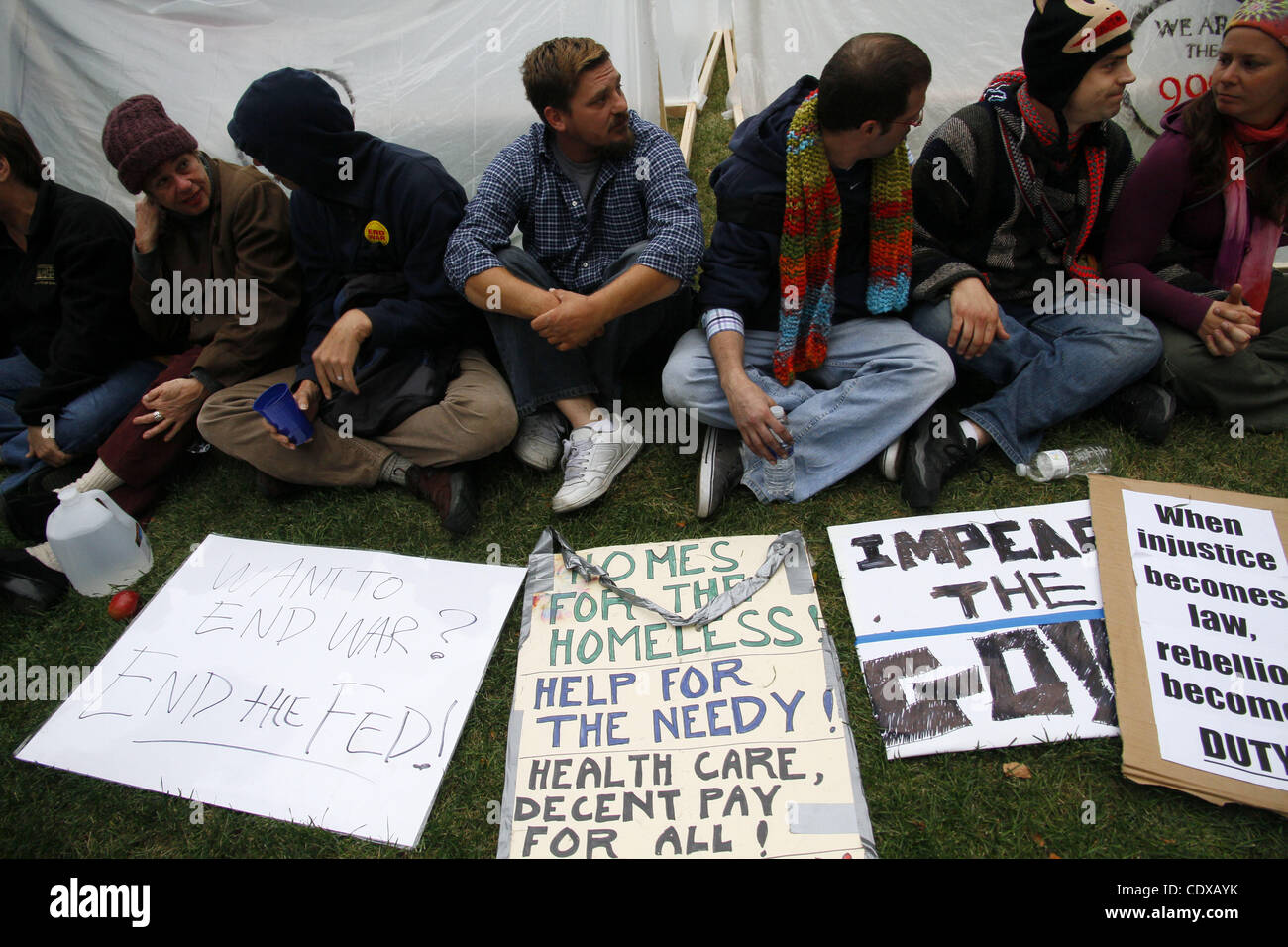 Protesters sit around clear tents set up on the grounds of Hennepin ...