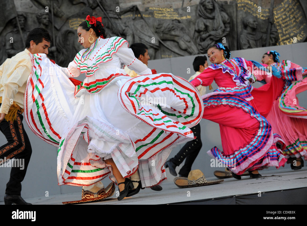 Ballet folklorico dancers perform onstage at Plaza Fundadores in ...