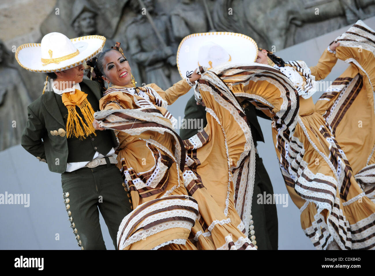 Ballet folklorico dancers perform onstage at Plaza Fundadores in ...
